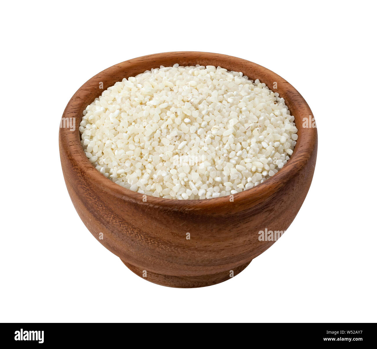 Small crushed rice in wooden bowl isolated on white background with ...