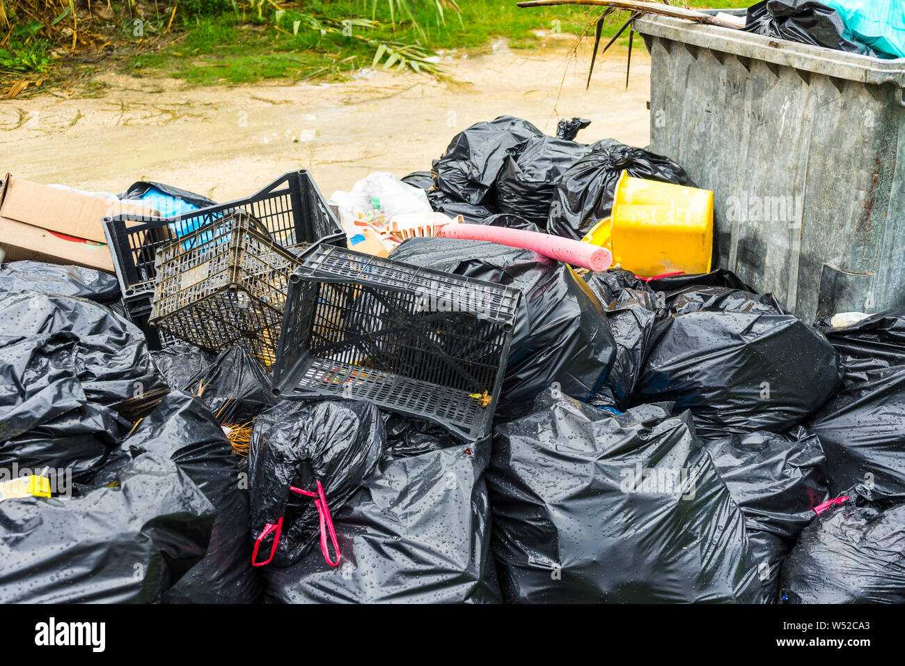 Junkyard of many plastic bags and other plastic trash in garden Stock ...