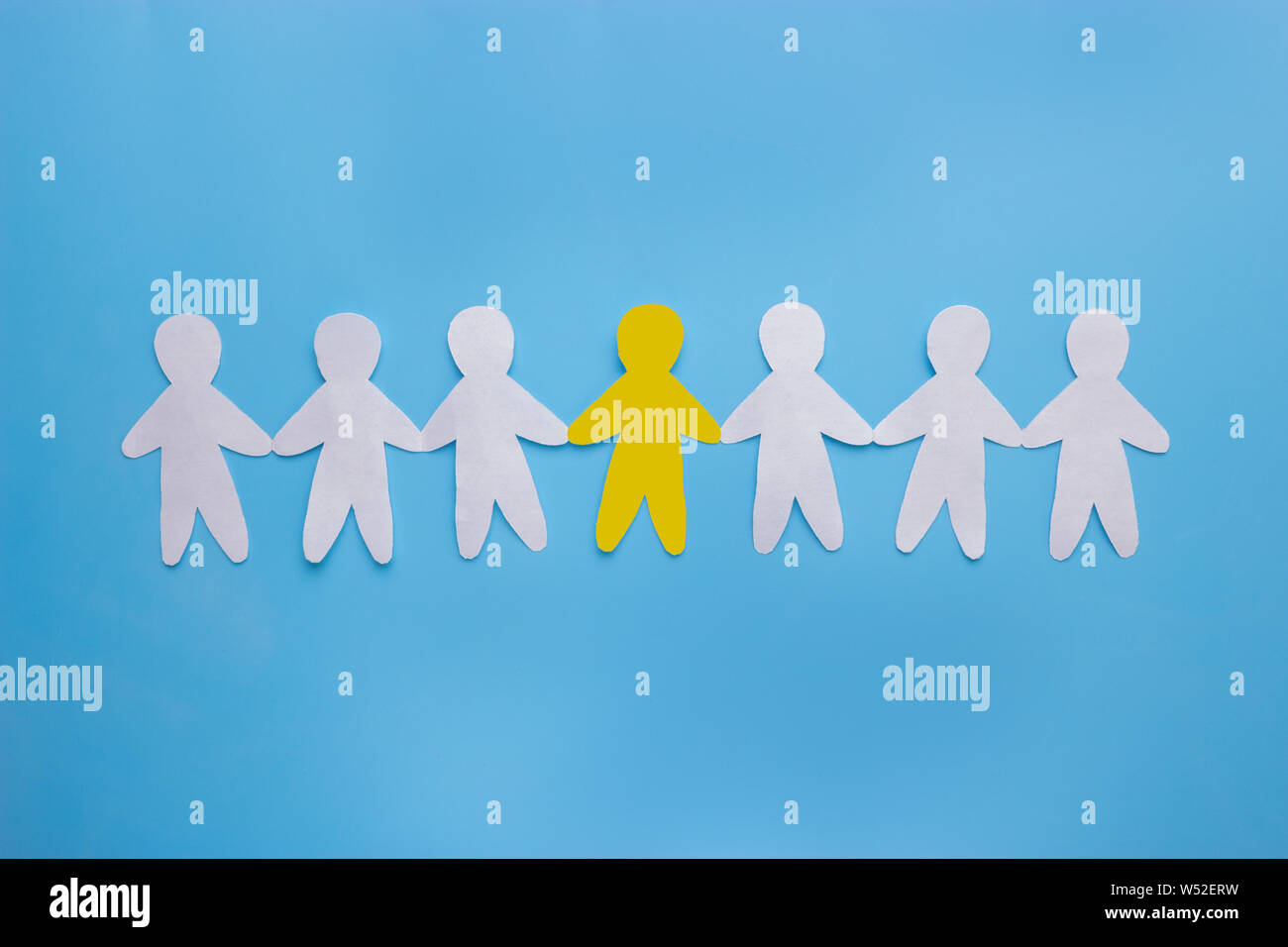 Paper people on the blue background. One different concept Stock Photo ...
