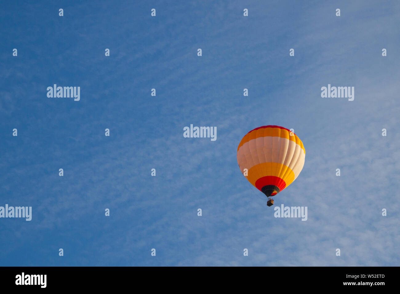 hot air ballon on the blue sky background Stock Photo - Alamy