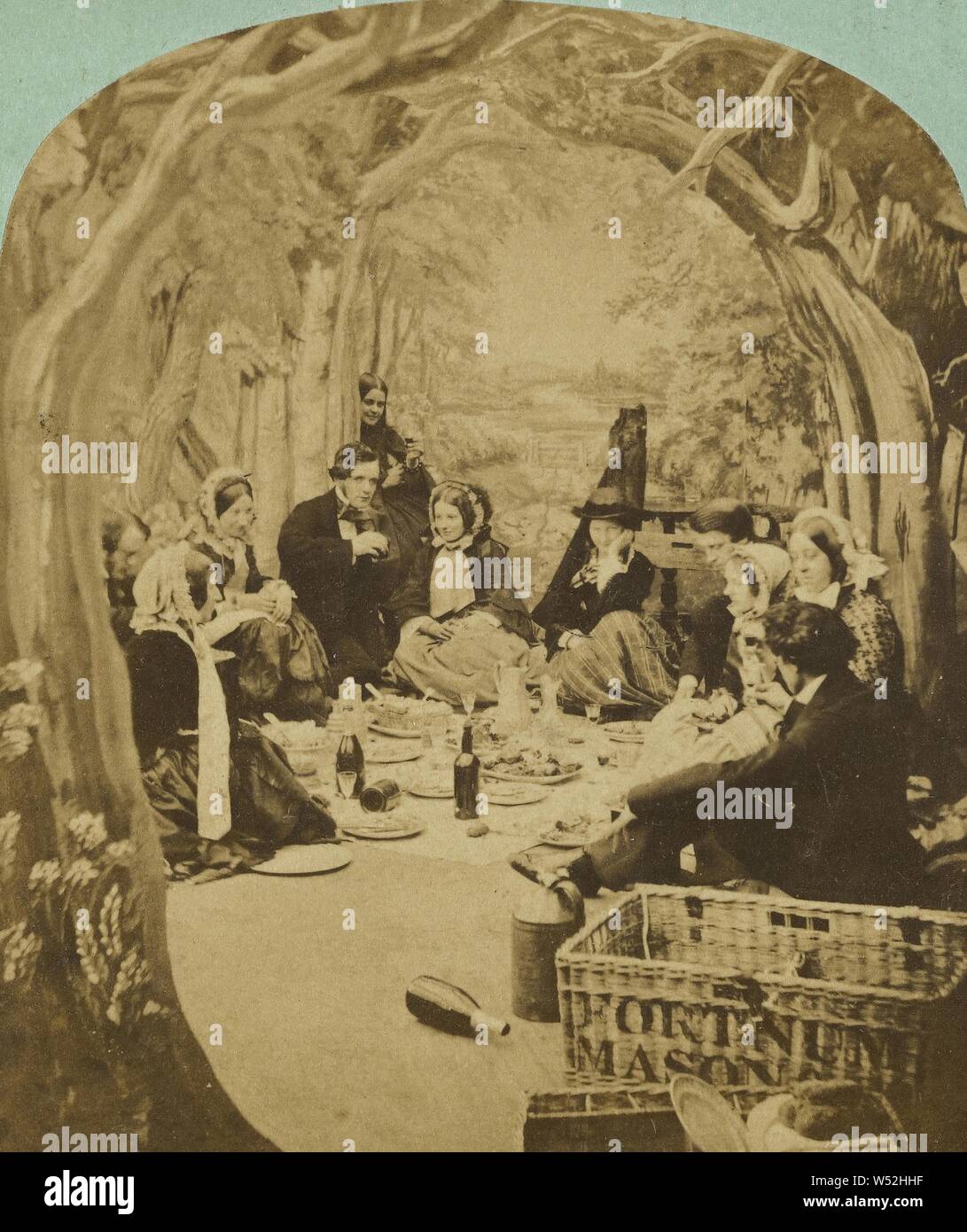 Picnic scene on the ground, basket with Fortnum Mason(---illeg.) in ...