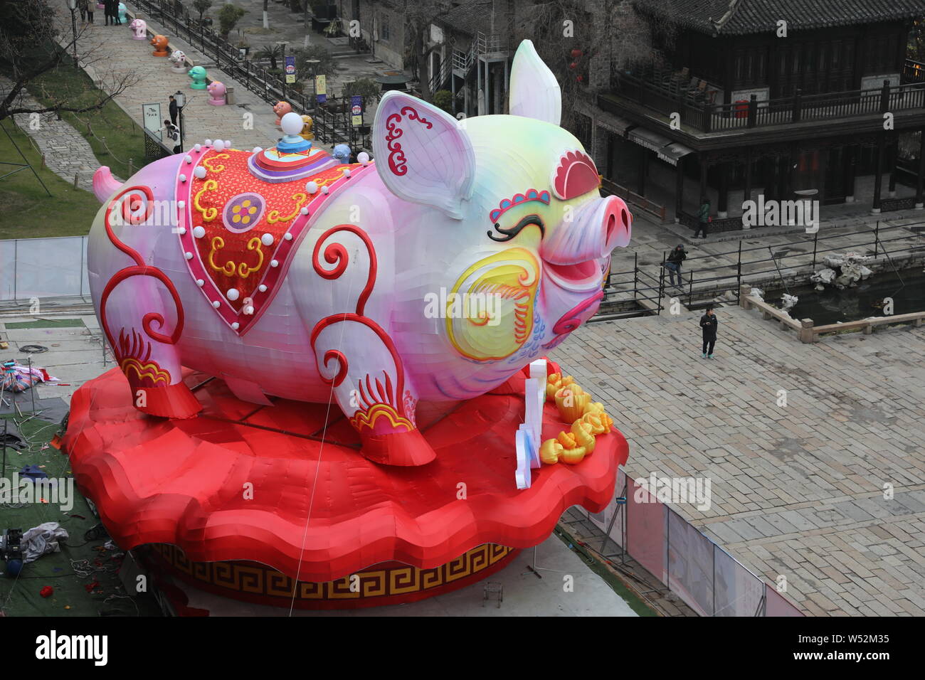A 10-meter-tall pig light installed for a lantern festival is pictured ...