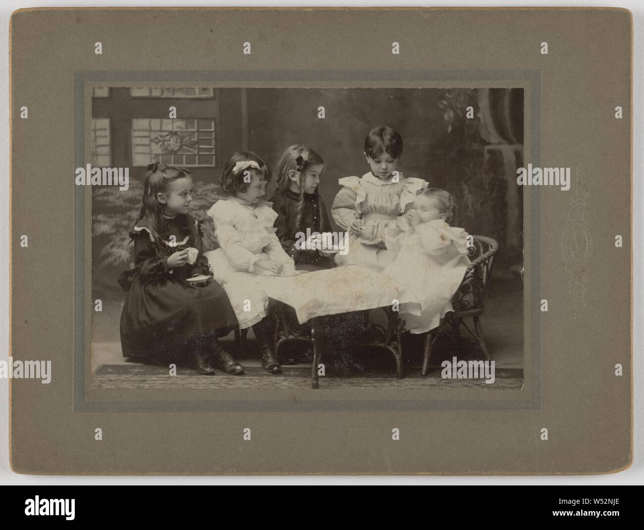 Five litle girls seated, at a tea party, Cramer (American, active 1900s ...