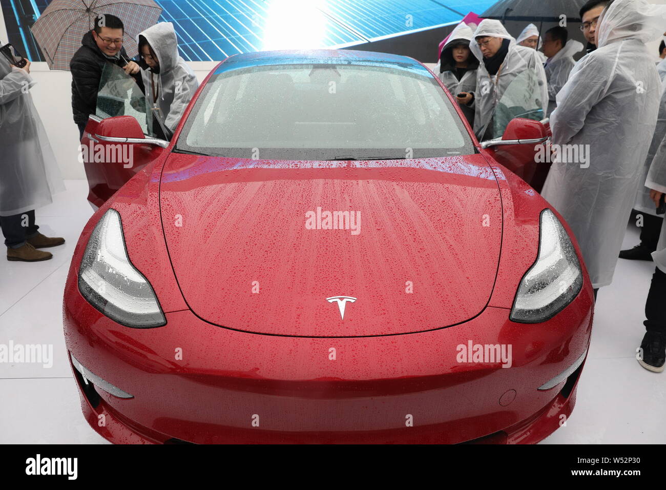 A Tesla Model 3 electric car is on display during the groundbreaking ...