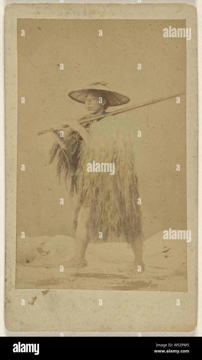 Straw rain cape hi-res stock photography and images - Alamy