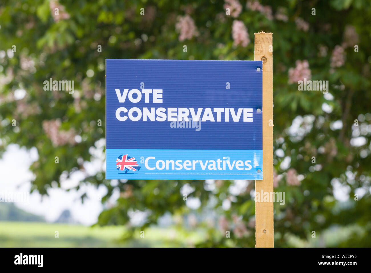 A Vote Conservative sign by a country lane in a rural constituency near ...