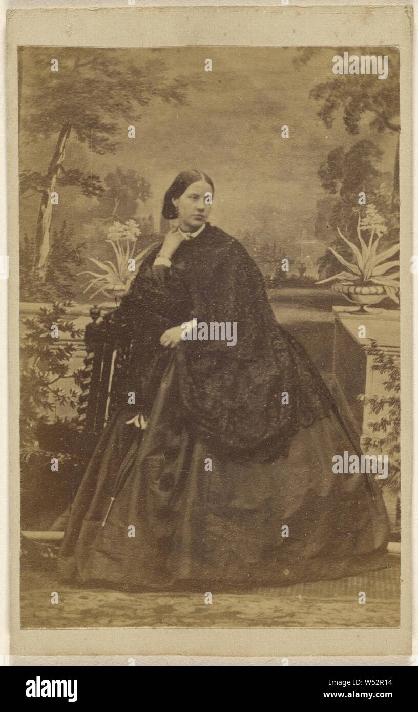 Unidentified woman seated, with hand to collar, Unknown, about 1865, Albumen silver print Stock ...