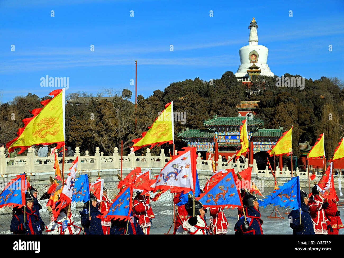Entertainers dressed in helmets and armor in the style of Manchu ...