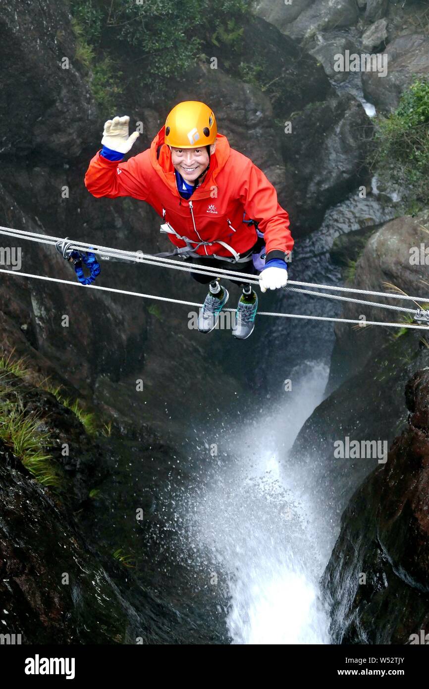69-year-old double-amputee Chinese climber Xia Boyu tries rock climbing ...