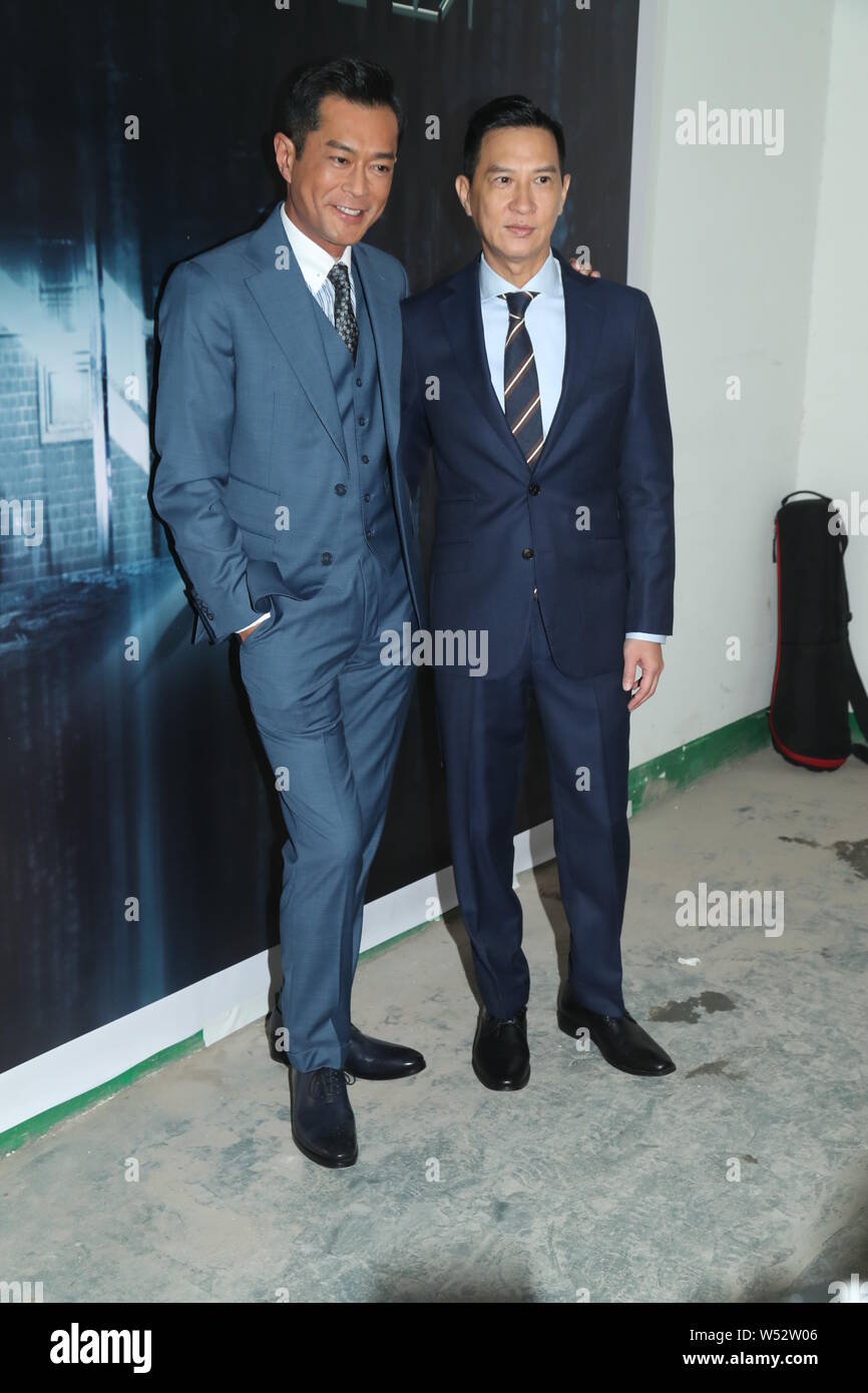 Hong Kong actors Louis Koo Tin-lok, left, and Nick Cheung Ka-fai pose ...
