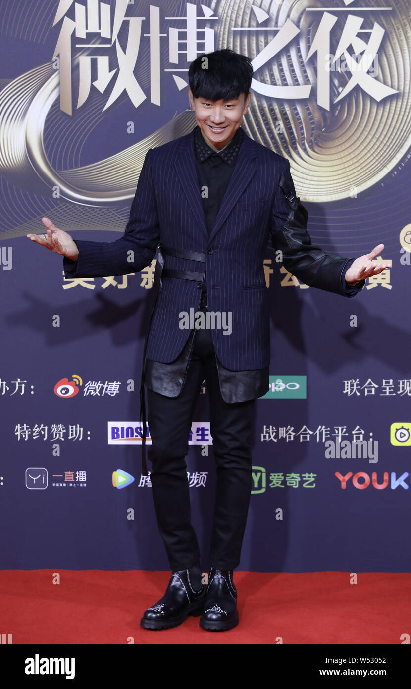 Singaporean singer JJ Lin poses as he arrives on the red carpet for ...