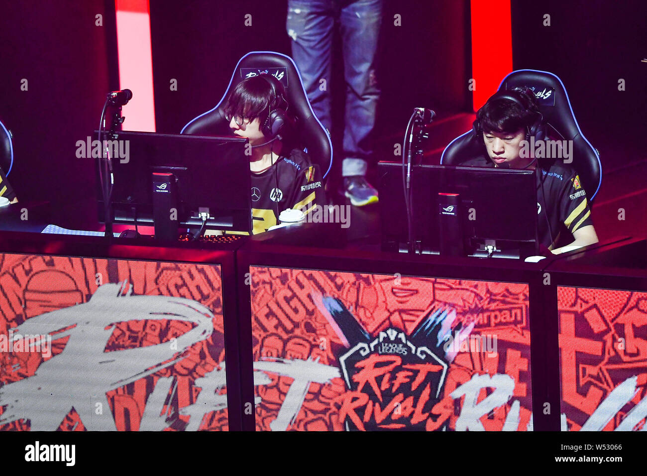 --FILE--(From left) MLXG and Xiaohu of China's Royal Never Give Up compete against South Korea's ...