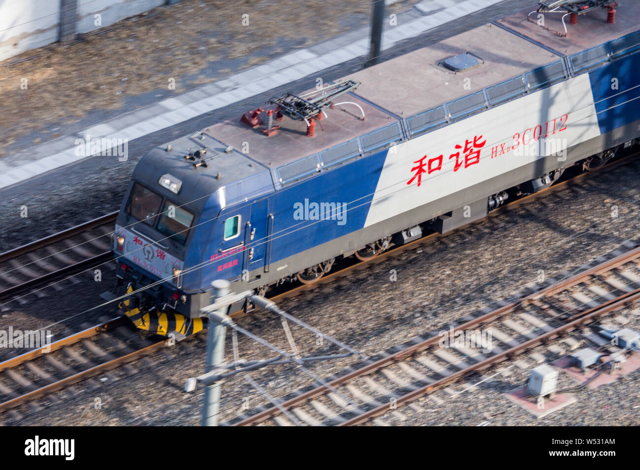 A passenger express train leaves the Beijing South railway station ...