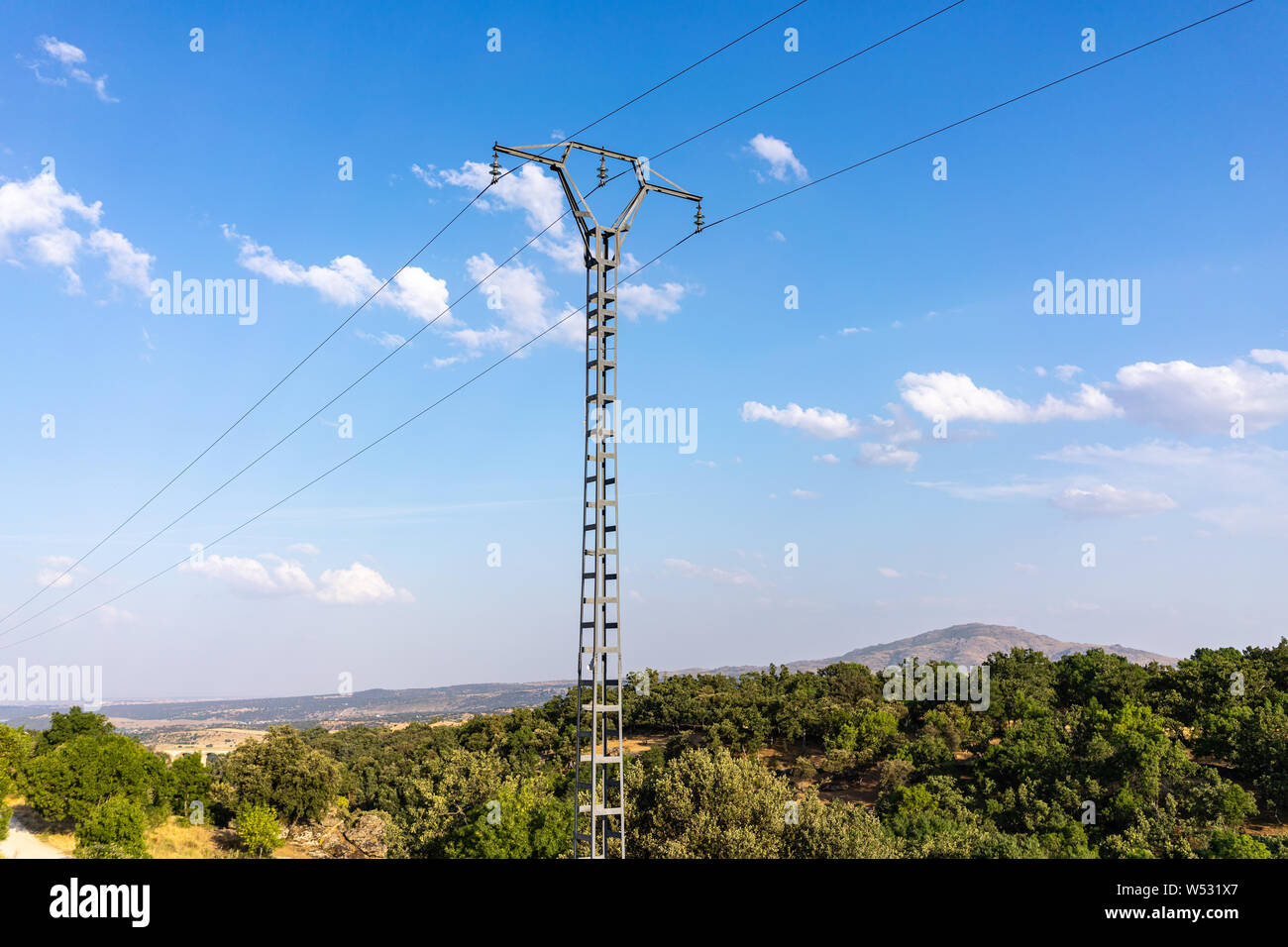 Small high voltage tower in the countryside Stock Photo - Alamy