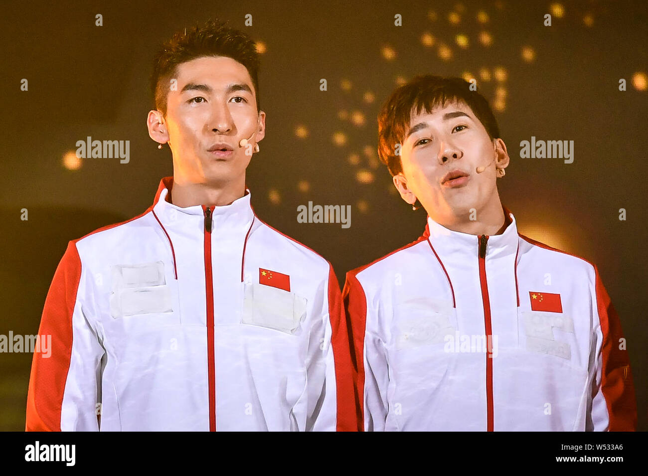Chinese short track speed skater Wu Dajing, left, the winner of the men ...