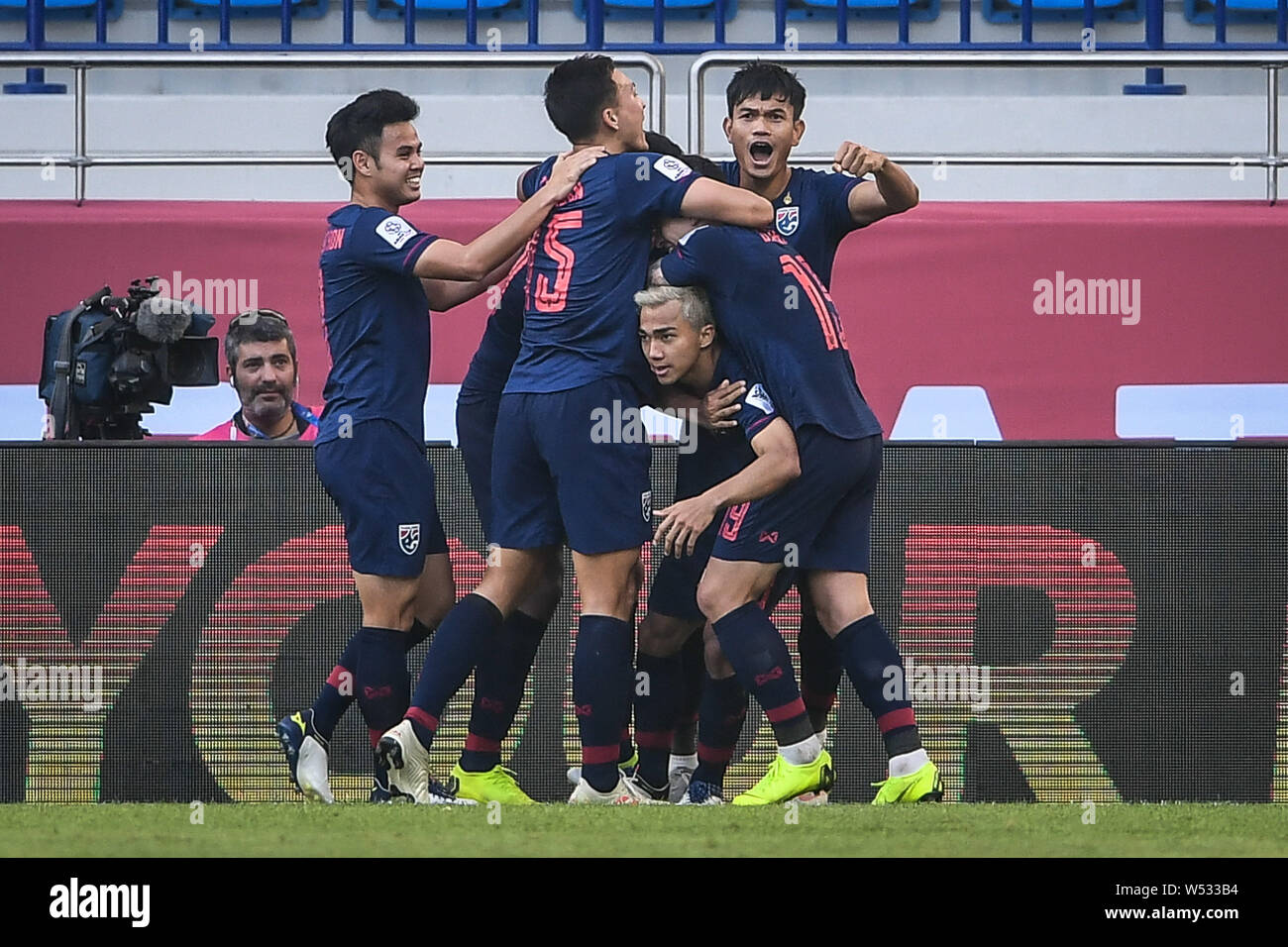 Players of Thailand celebrate after scoring against Bahrain in their ...