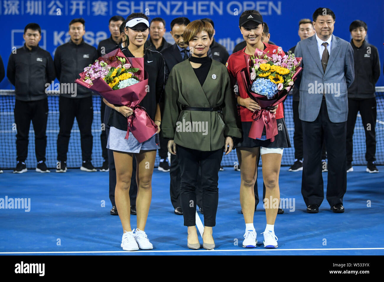 Peng Shuai, right, and Yang Zhaoxuan of China pose with their trophy ...