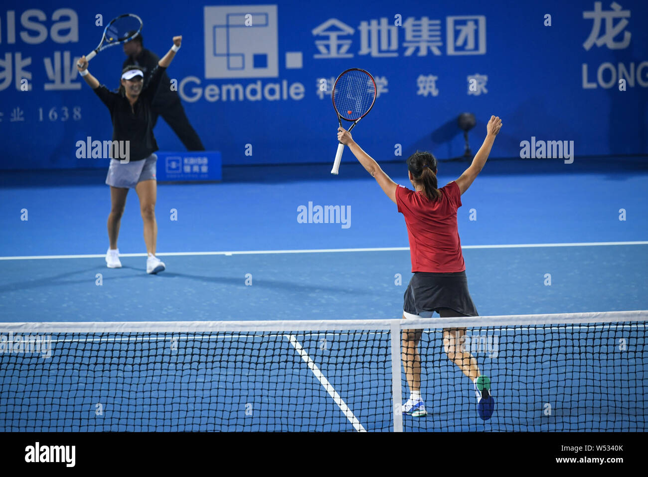 Peng Shuai and Yang Zhaoxuan of China react as they compete against ...