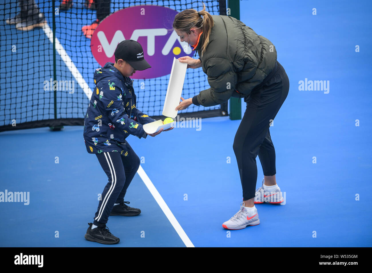 Russian tennis player Maria Sharapova attends the Champion Children Day ...