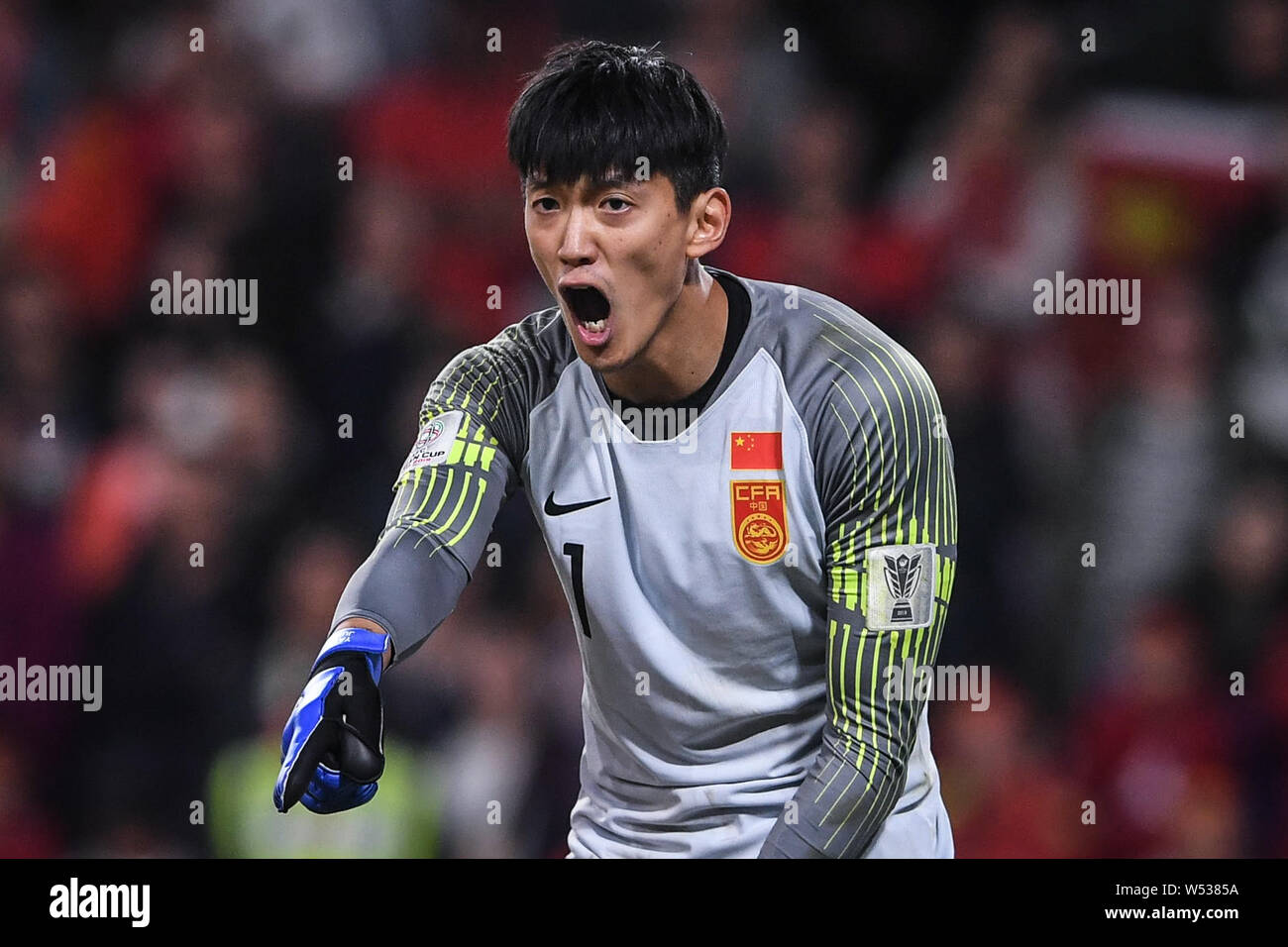 Yan Junling of China reacts in the round of 16 match against Thailand ...