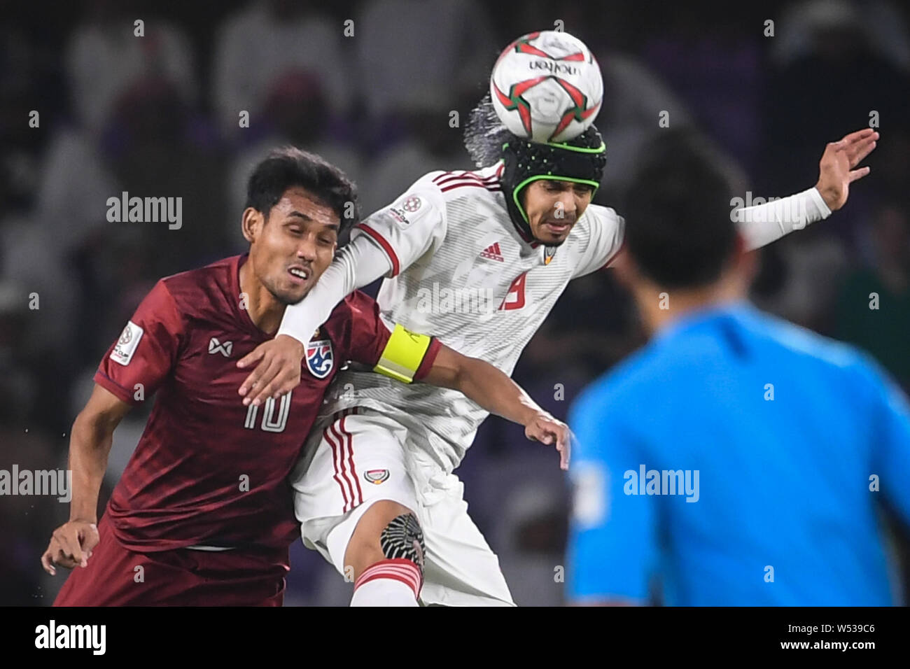 Ismail Ahmed, top, of United Arab Emirates national football team heads ...