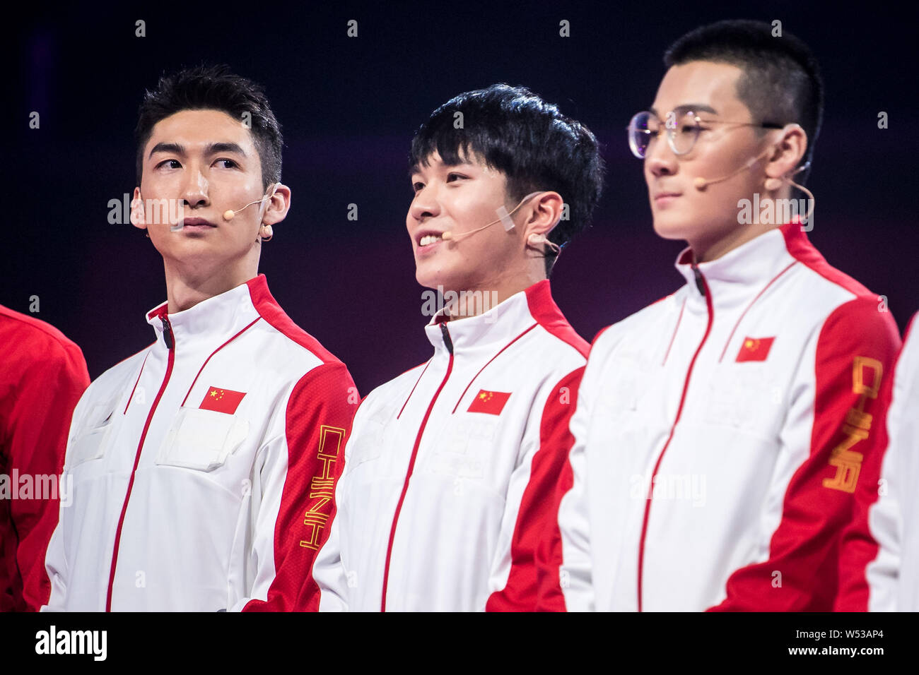 Chinese short track speed skater Wu Dajing, left, the winner of the men ...