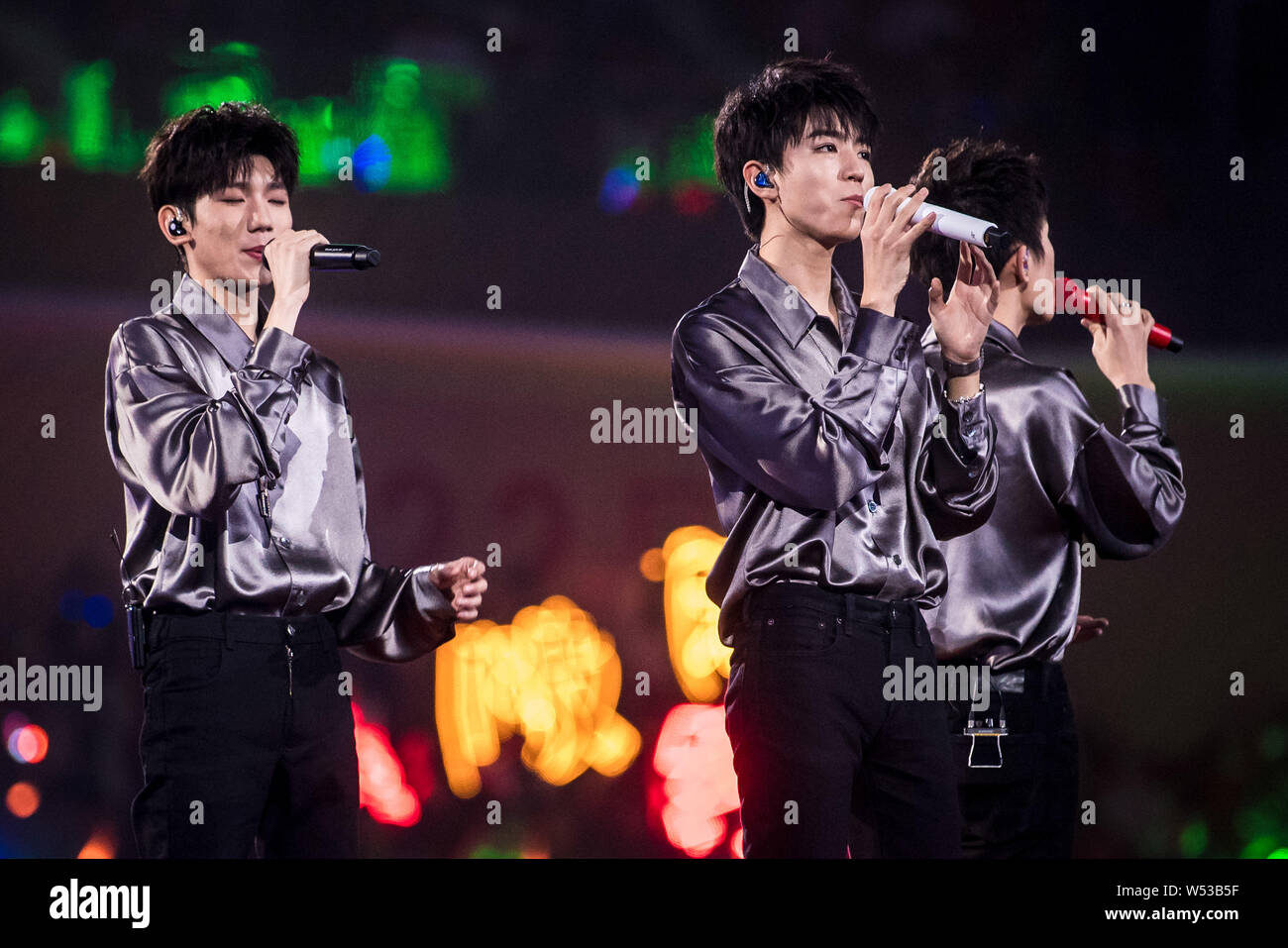 (From left) Roy Wang or Wang Yuan, Karry Wang or Wang Junkai, and ...