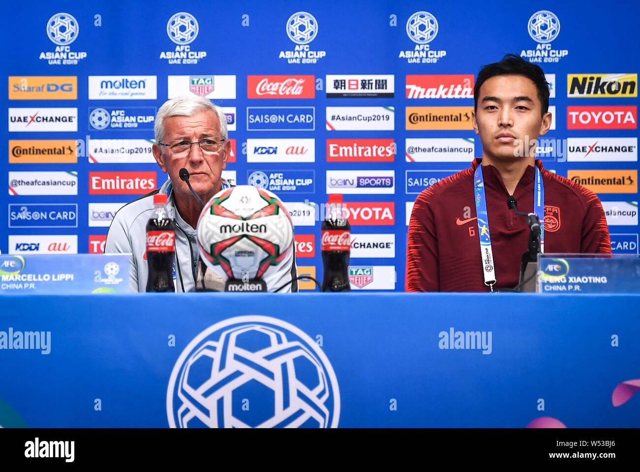 Head coach Marcello Lippi, left, and Feng Xiaoting of Chinese national ...