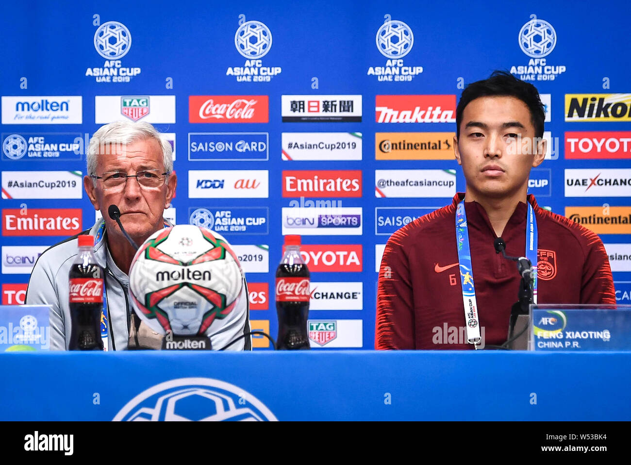 Head coach Marcello Lippi, left, and Feng Xiaoting of Chinese national ...