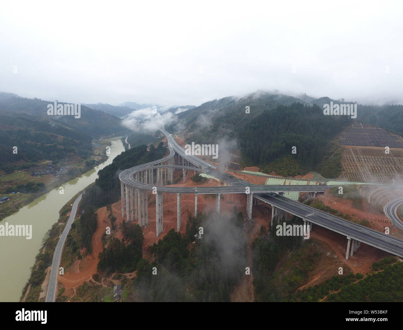 A section of Libo-Rongjiang expressway stretches over the mountains in ...