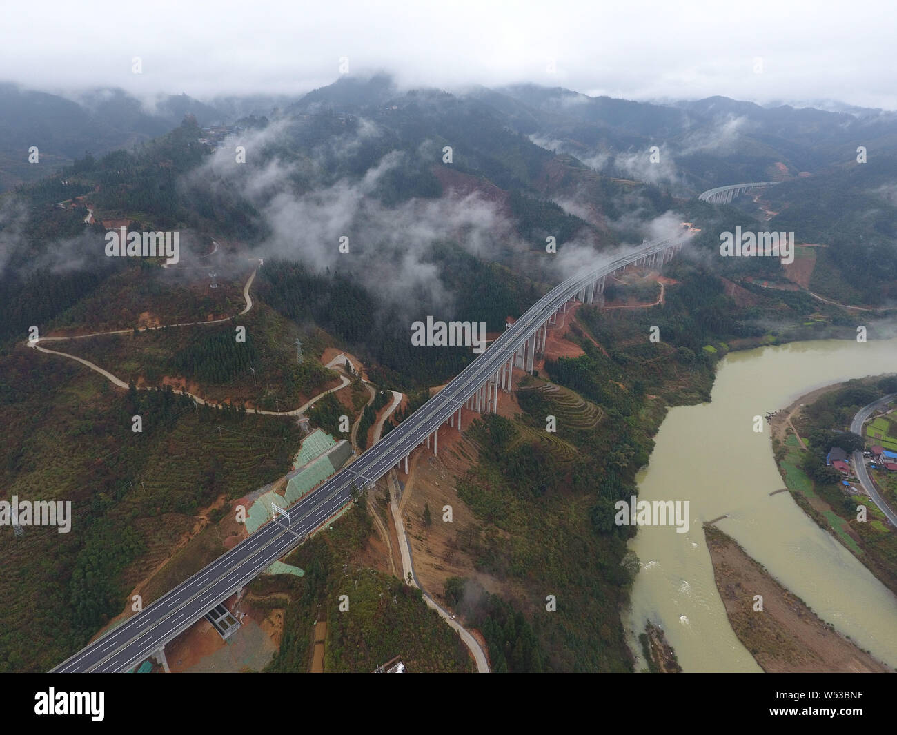 A section of Libo-Rongjiang expressway stretches over the mountains in ...