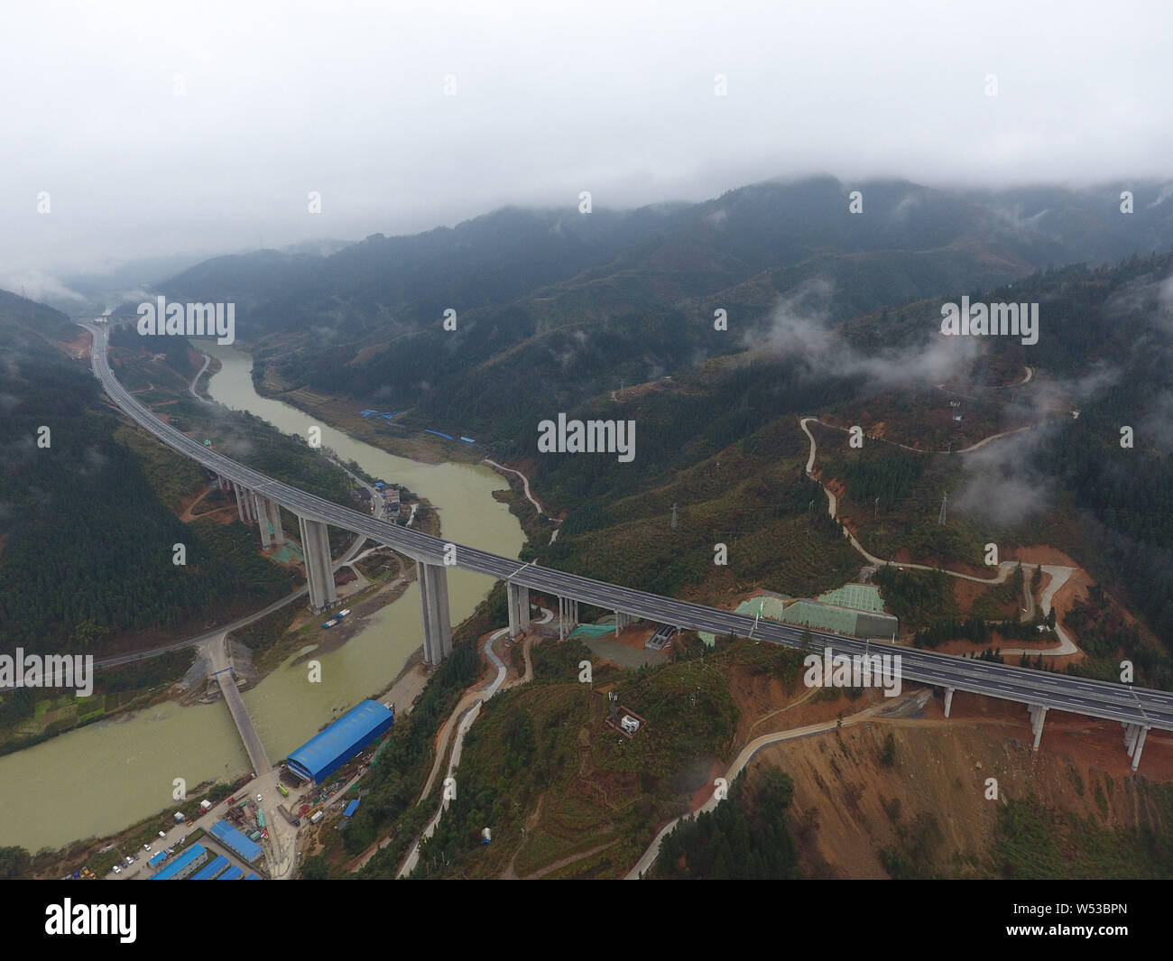 A section of Libo-Rongjiang expressway stretches over the mountains in ...