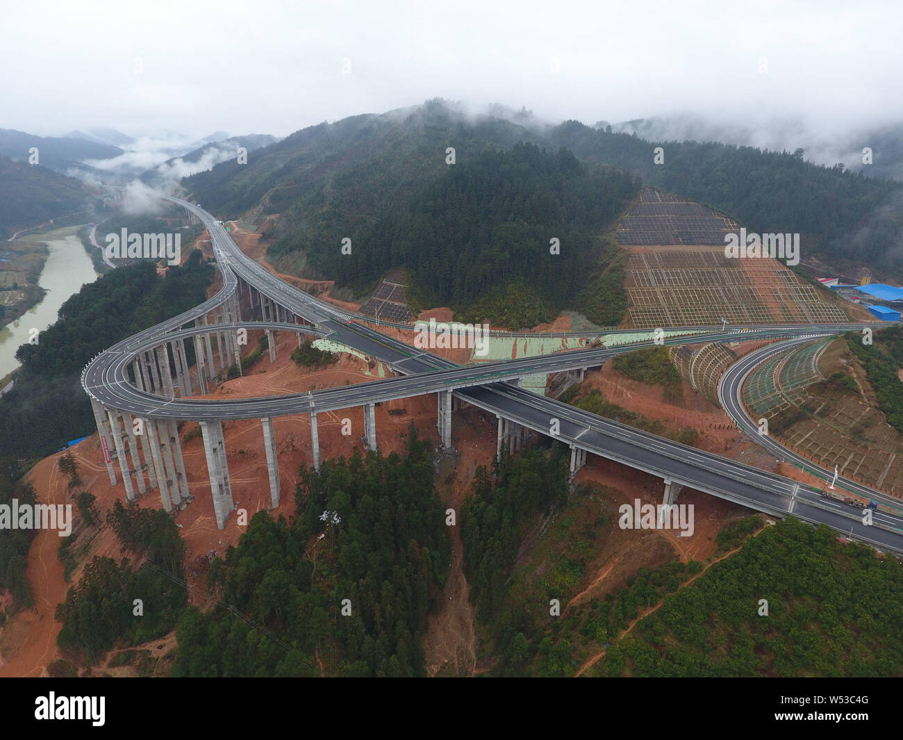 A section of Libo-Rongjiang expressway stretches over the mountains in ...
