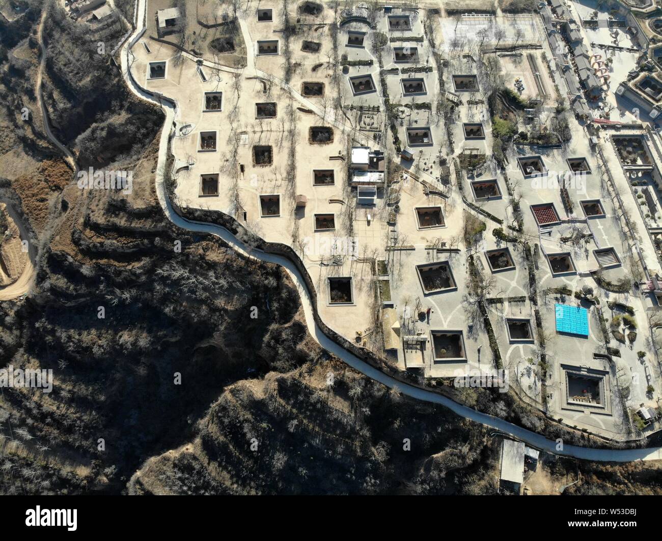 An aerial view of "pit courtyards" built in loess land pits in ...