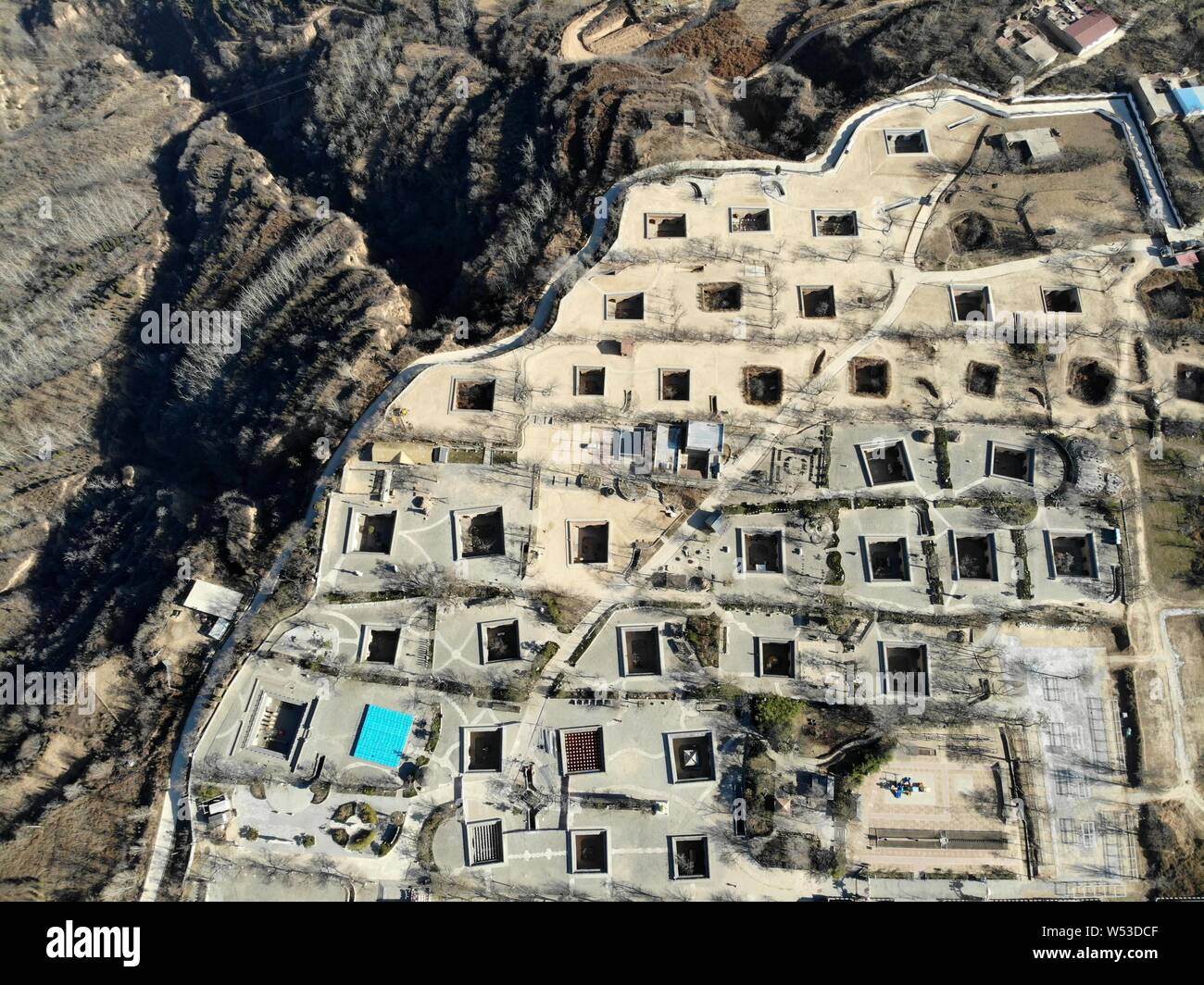 An aerial view of "pit courtyards" built in loess land pits in ...