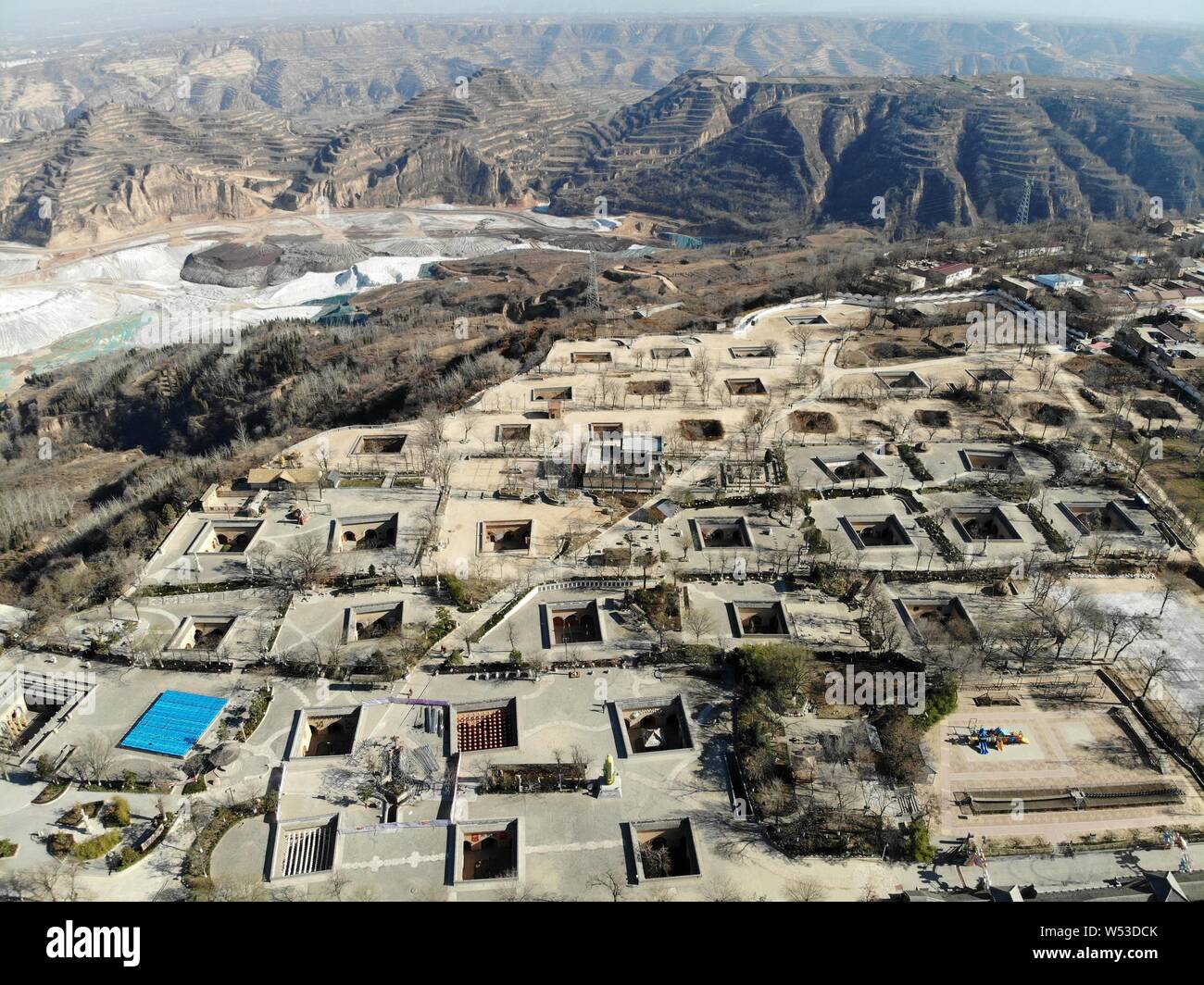 An aerial view of "pit courtyards" built in loess land pits in ...