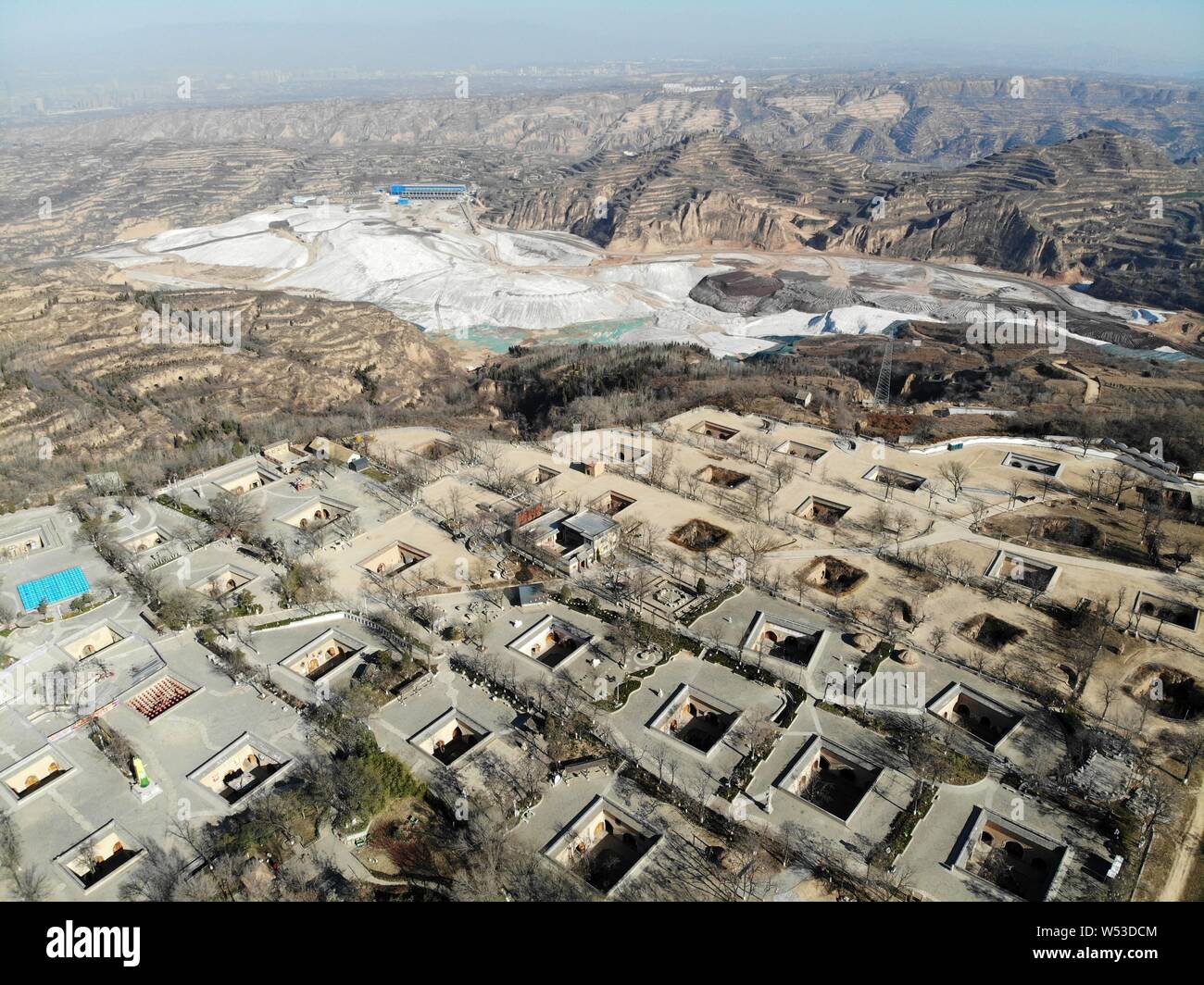 An aerial view of "pit courtyards" built in loess land pits in ...