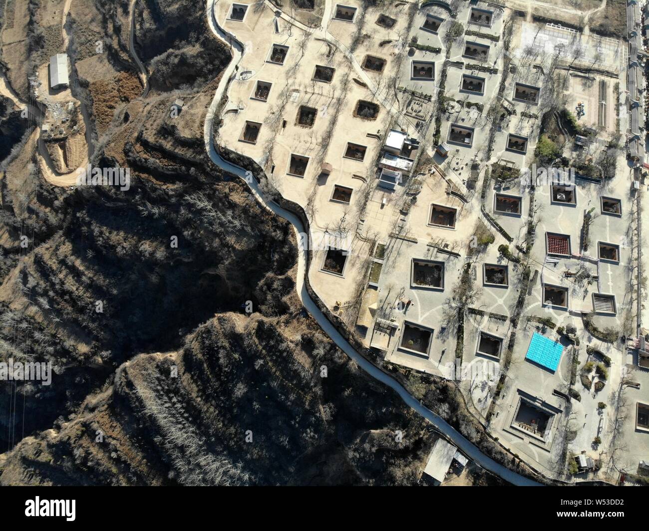 An aerial view of "pit courtyards" built in loess land pits in ...