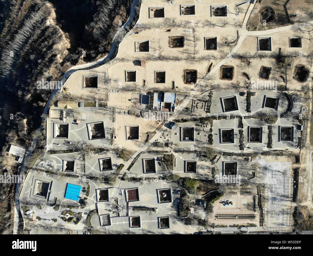 An aerial view of "pit courtyards" built in loess land pits in ...