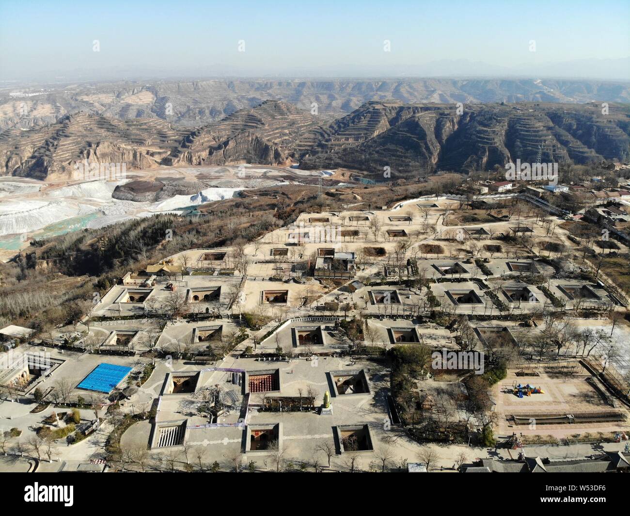 An aerial view of "pit courtyards" built in loess land pits in ...