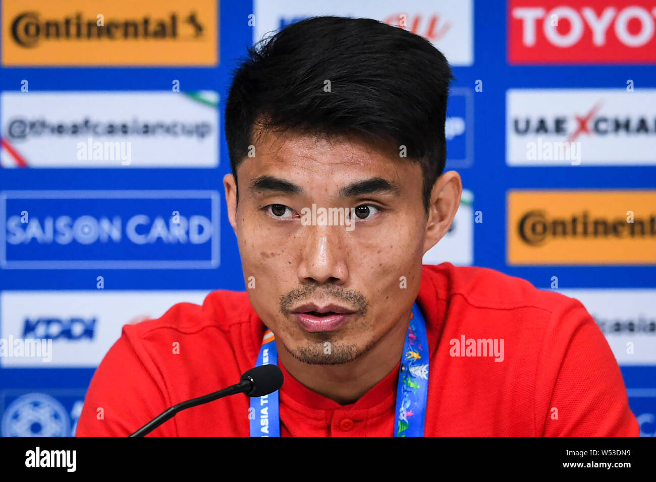 Zheng Zhi of Chinese national men's football team attends a press conference before the AFC ...