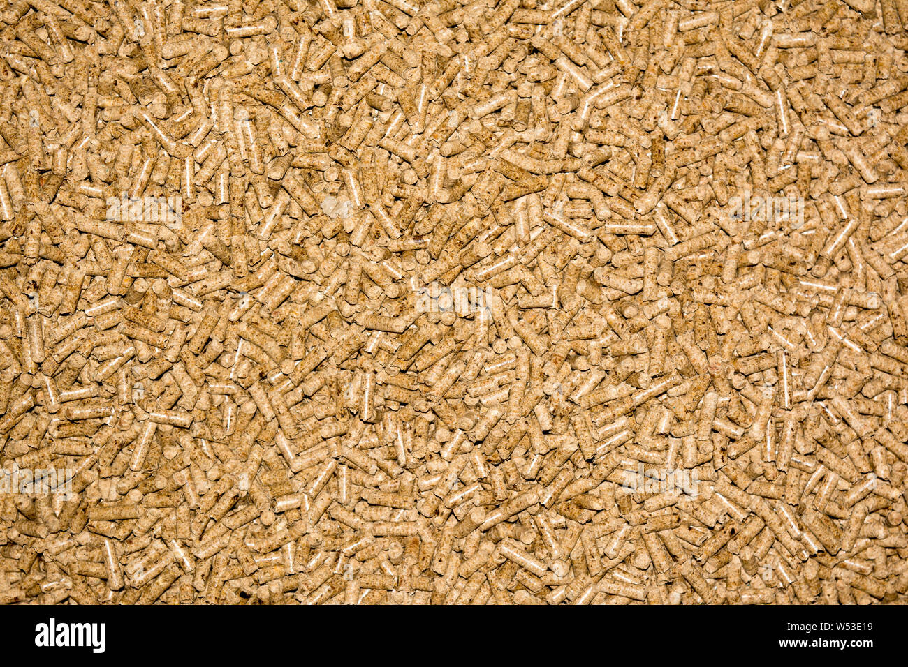 Compressed wood ecolgy pellet close up photo Stock Photo - Alamy