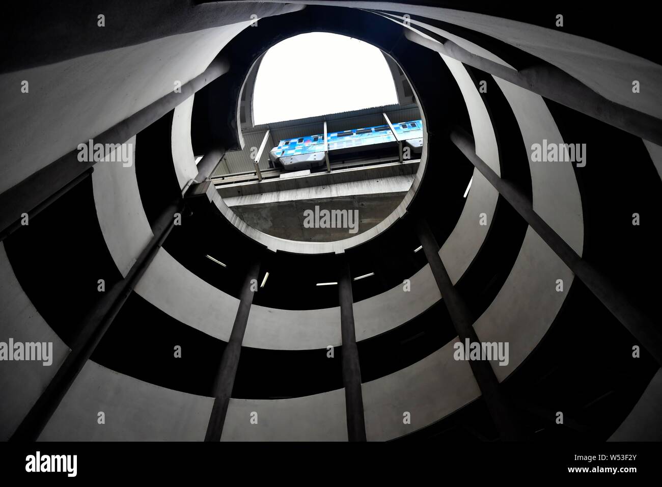 A worm's eye view from the bottom of the five-story spiral parking lot ...