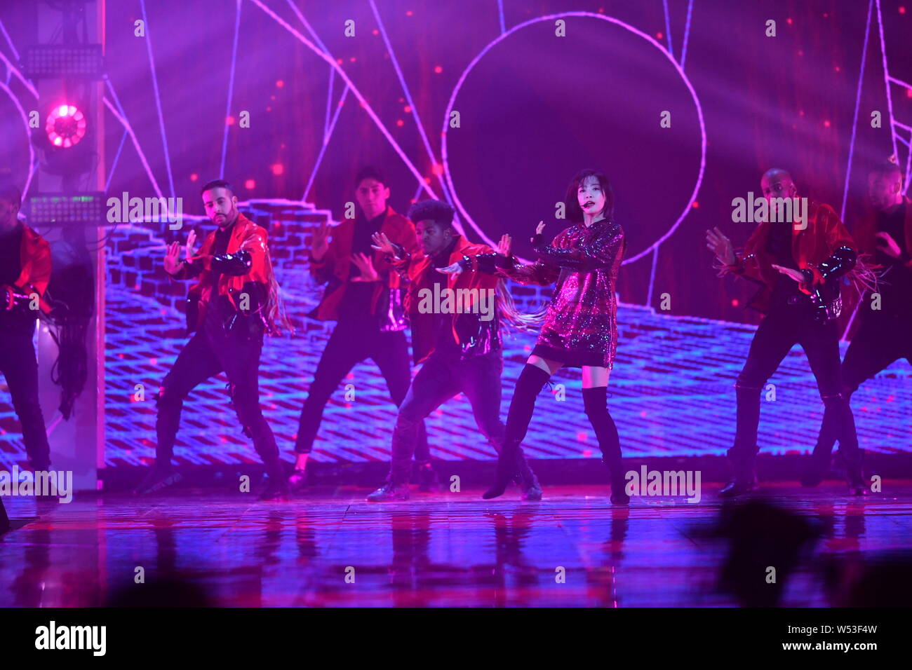 Chinese singer and actress Victoria Song or Song Qian, center, performs ...