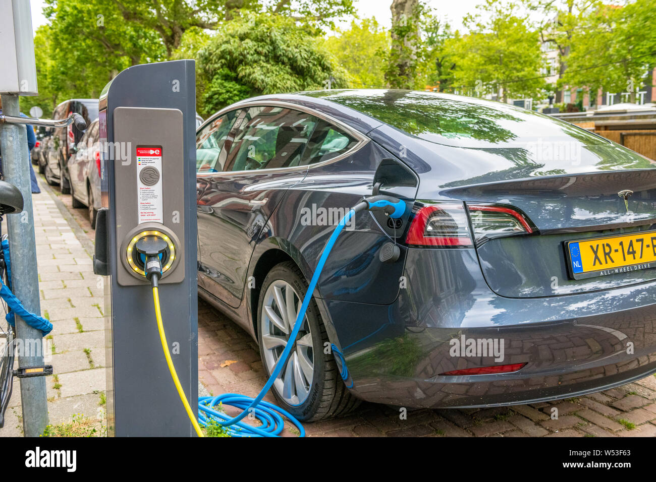 External electric car charging point at the side of a canal in ...