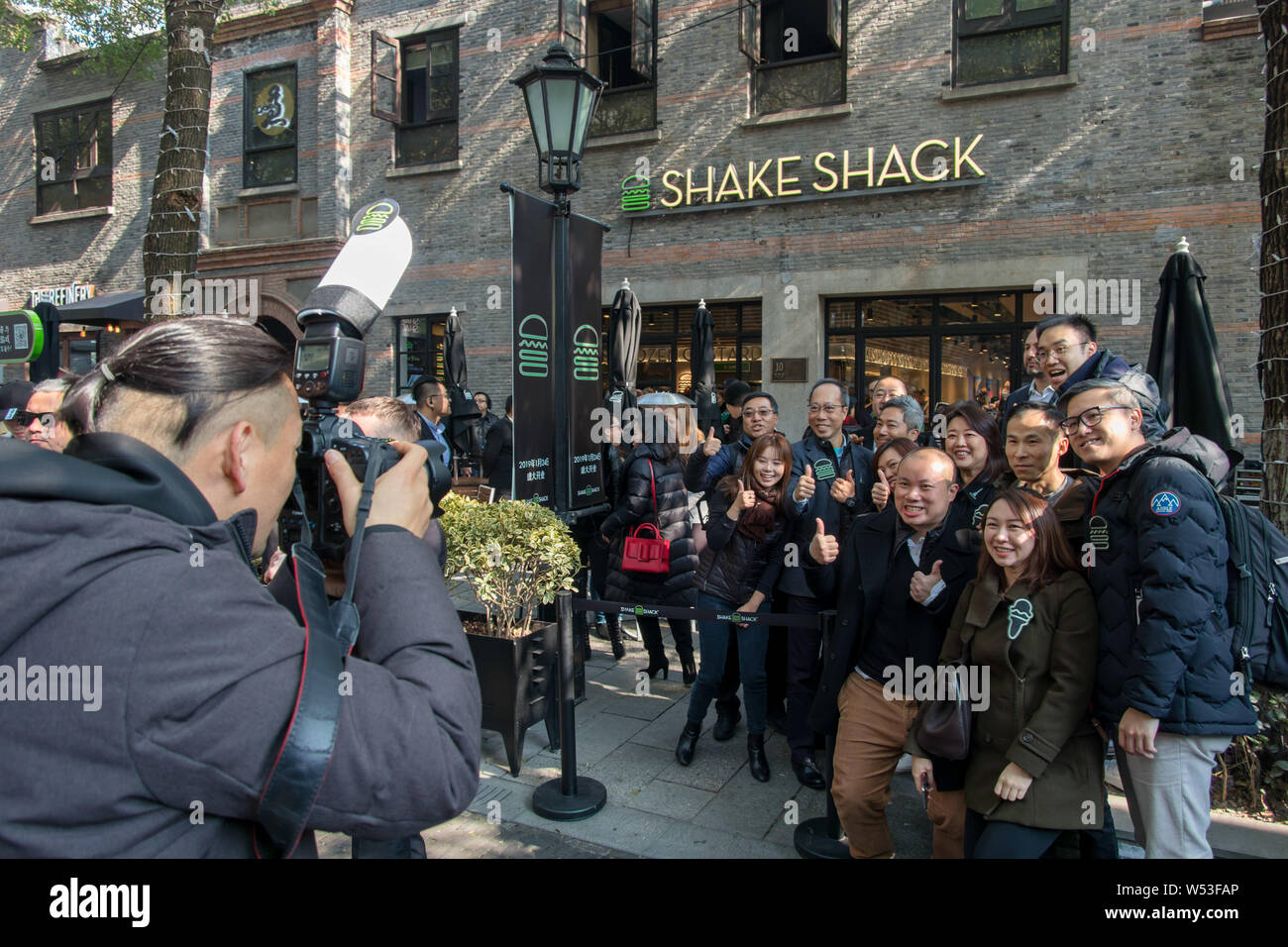 Customers queue up in front of China's first branch Shake Shack at the ...