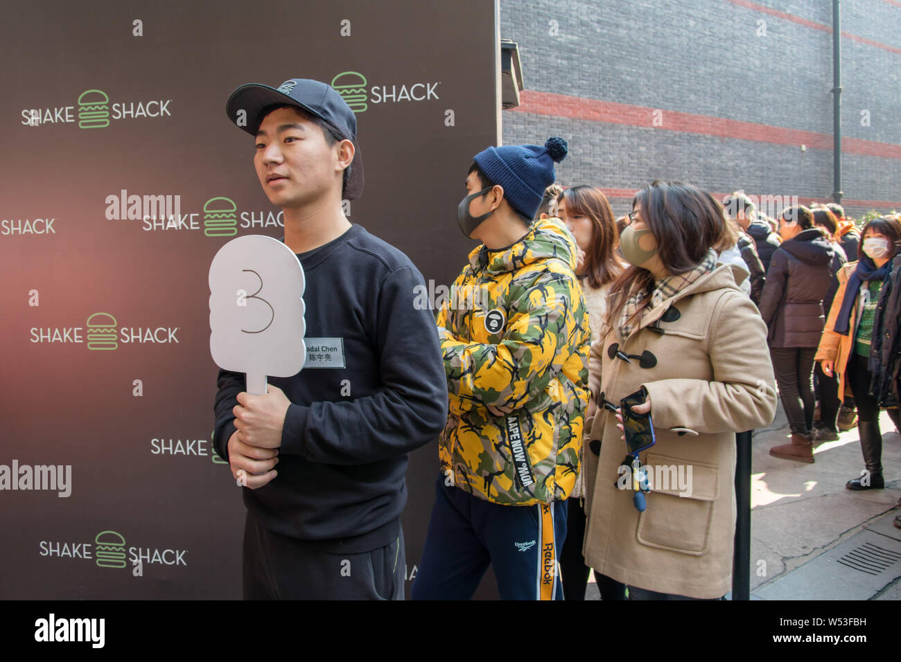 Customers queue up in front of China's first branch Shake Shack at the ...