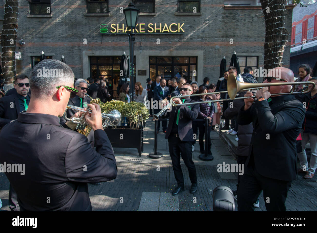 Customers queue up in front of China's first branch Shake Shack at the ...