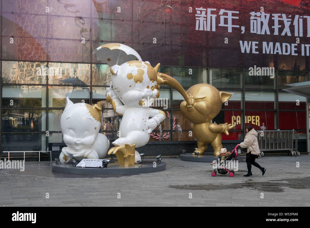 View of the "3 Slick Piggies" installation by OG Slick on display at ...