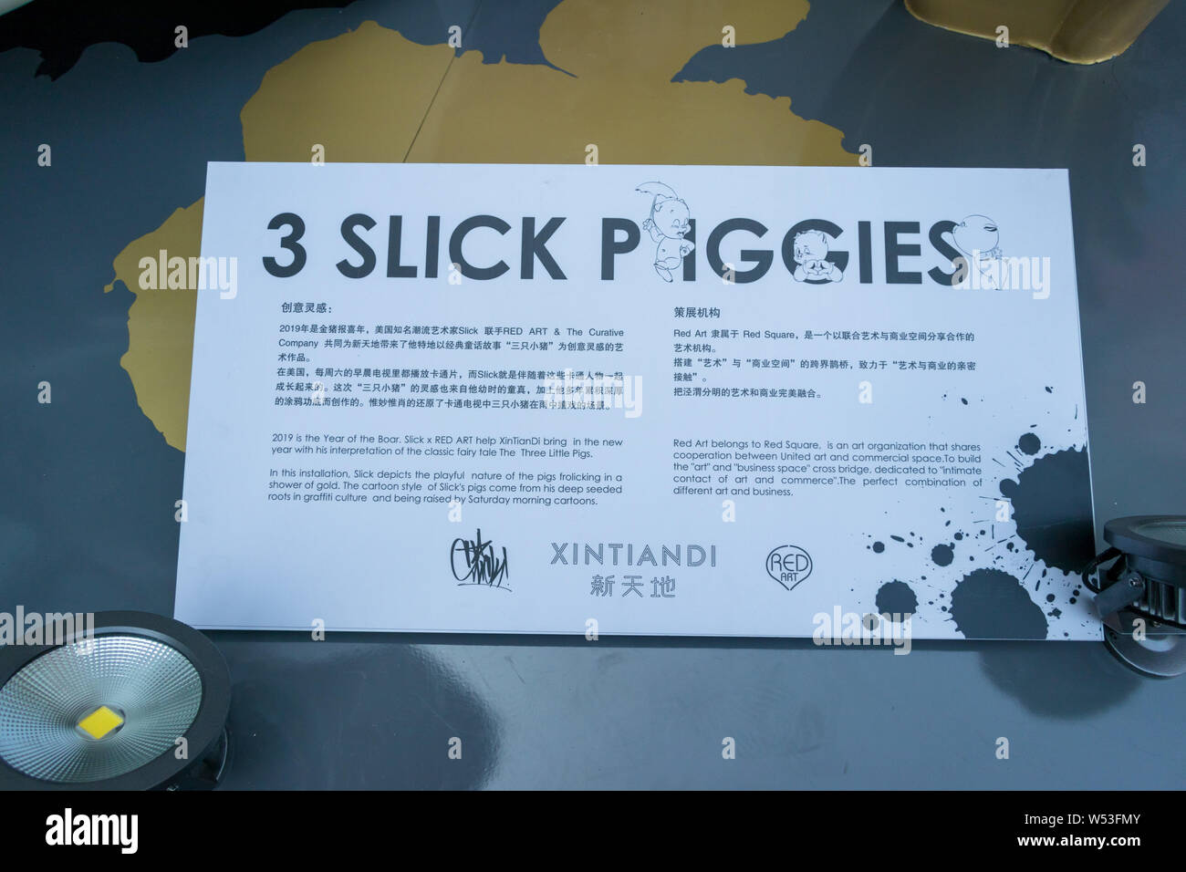 View of the "3 Slick Piggies" installation by OG Slick on display at ...